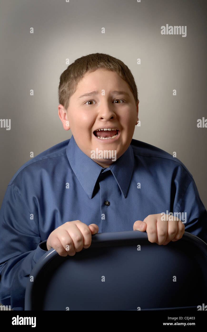 A scared, startled, excited or stressed by holding on to the back of a ...