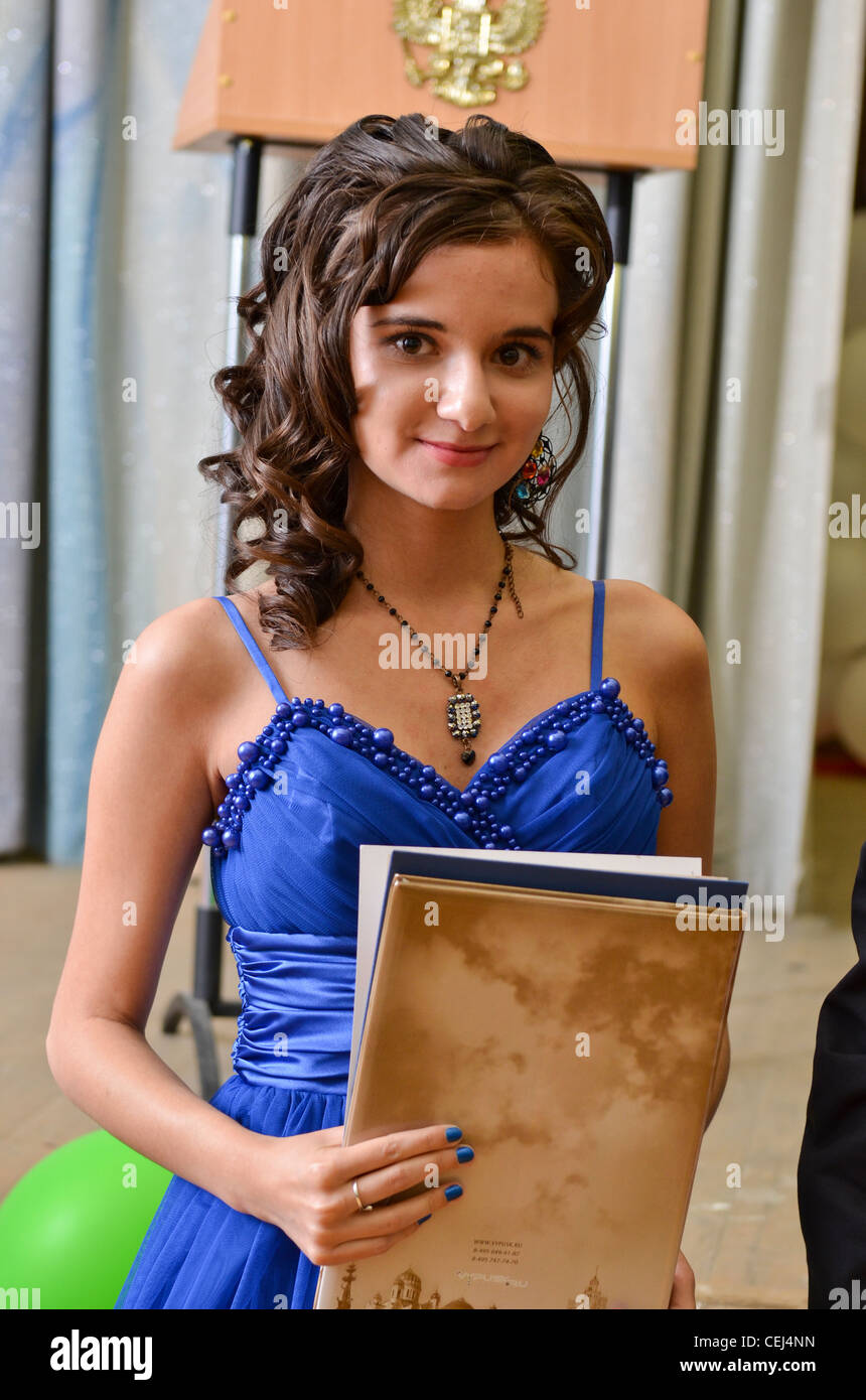 Elementary school graduate with diploma Stock Photo - Alamy