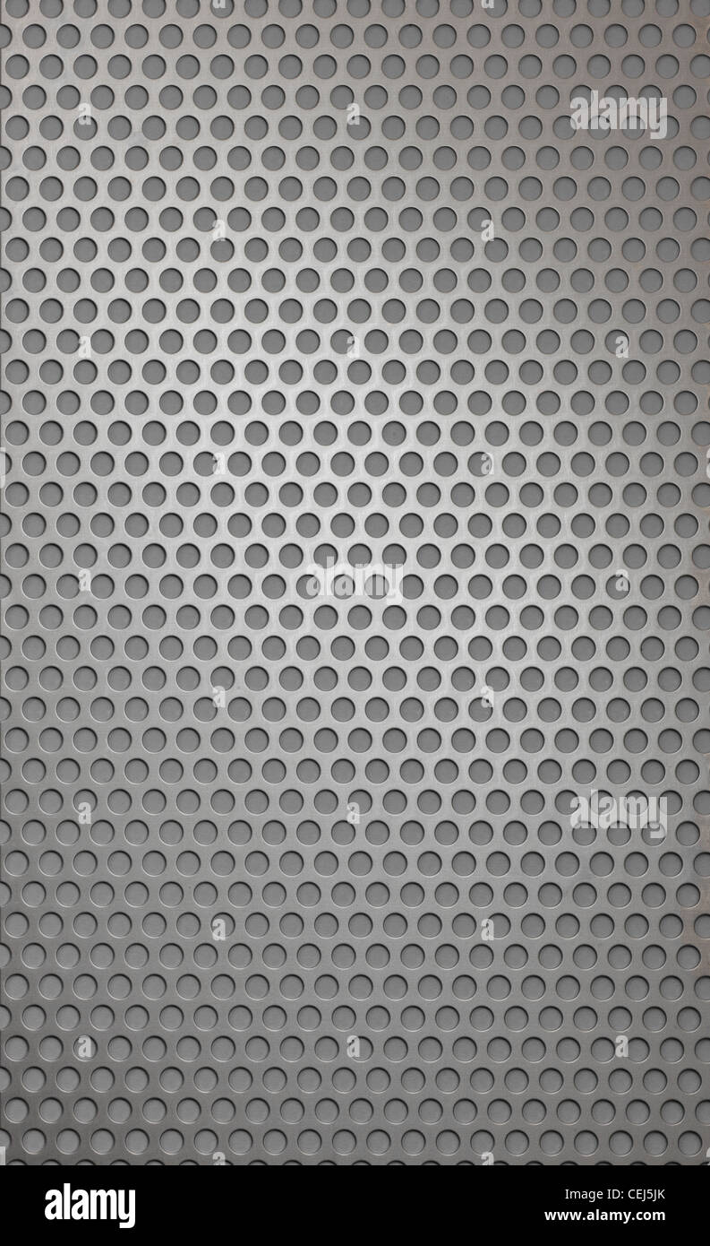Metal textured background with holes drilled in Stock Photo - Alamy