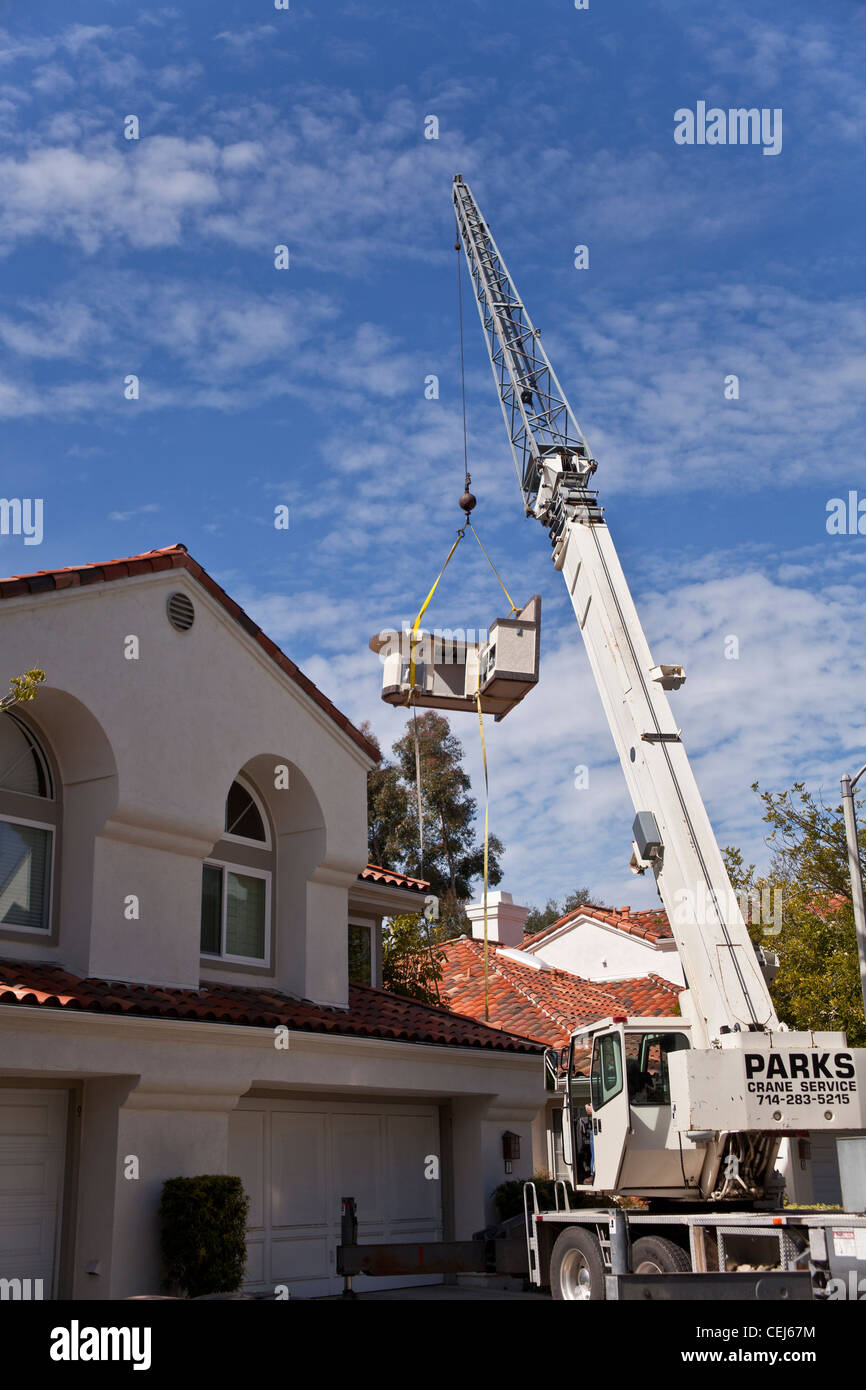 Crane lifting BBQ/outdoor Kitchen into backyard of Southern California ...
