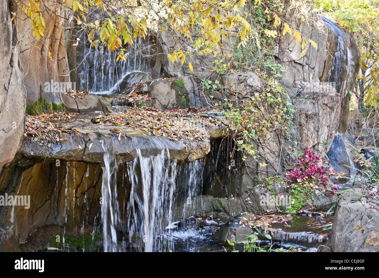 Small waterfall falling down in hi-res stock photography and images - Alamy