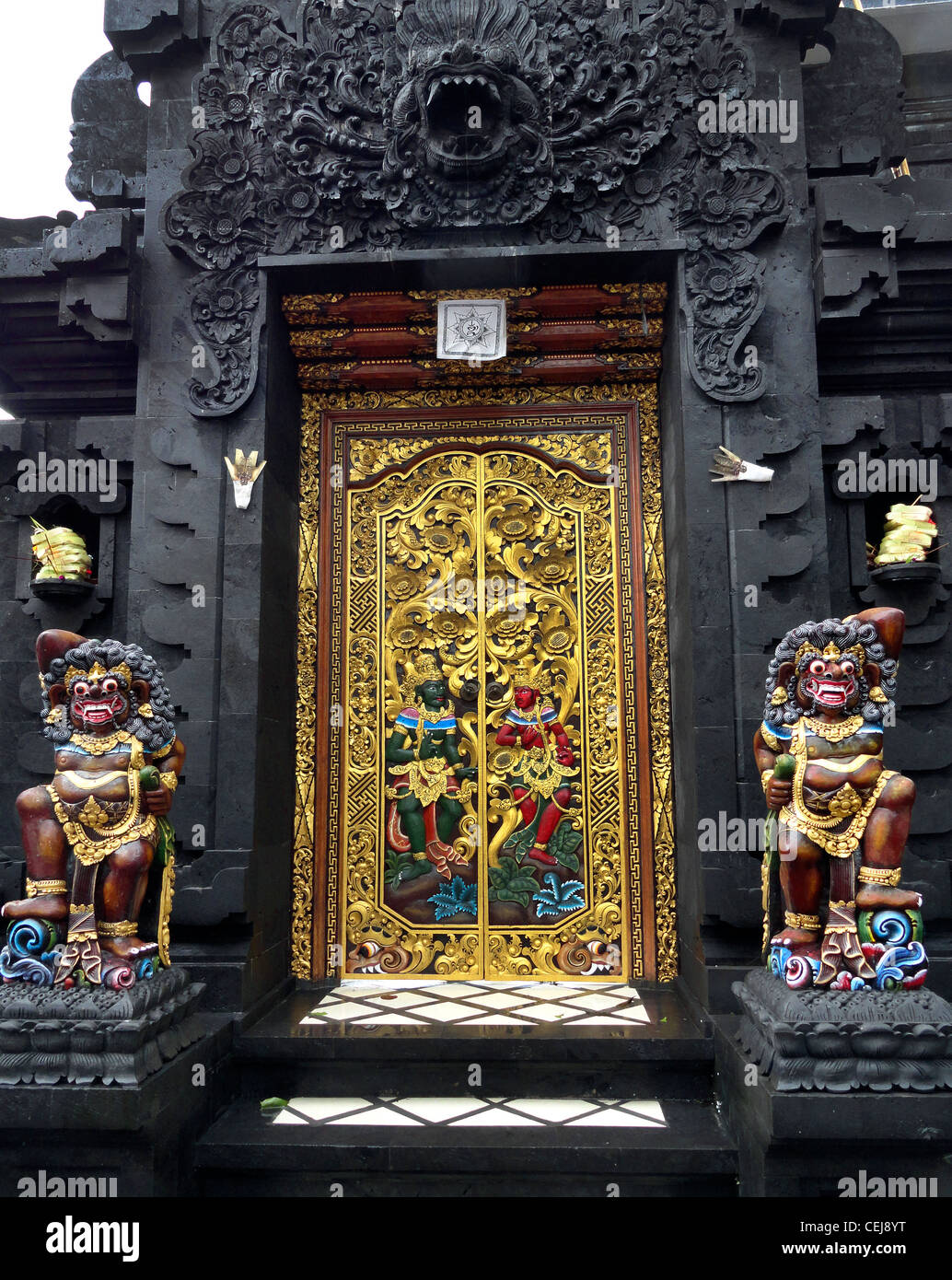 Ornate gilded decorative Hindu temple door, Dempasar, Bali, Indonesia ...
