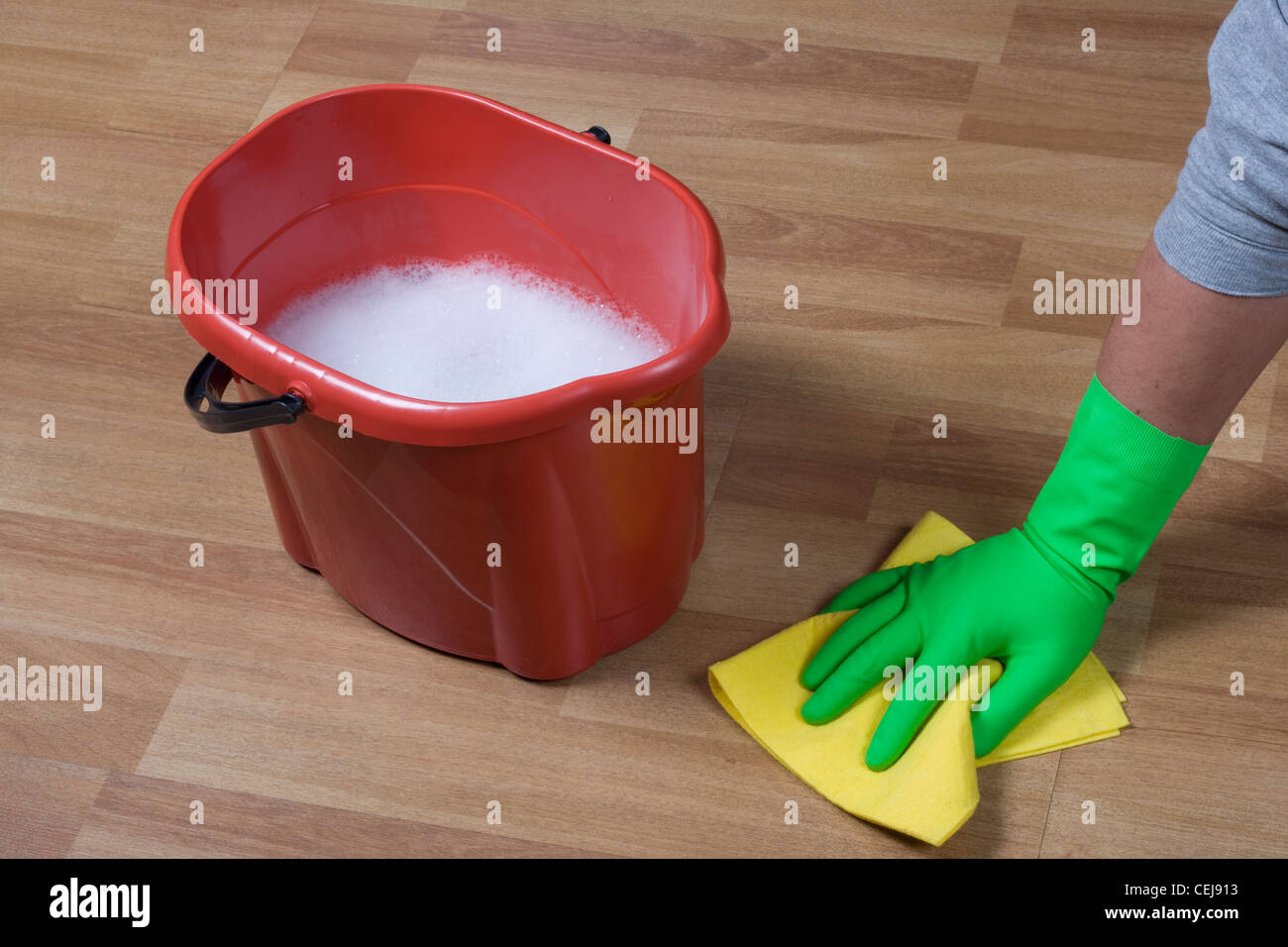 cleaning equipment and wooden parquet Stock Photo - Alamy