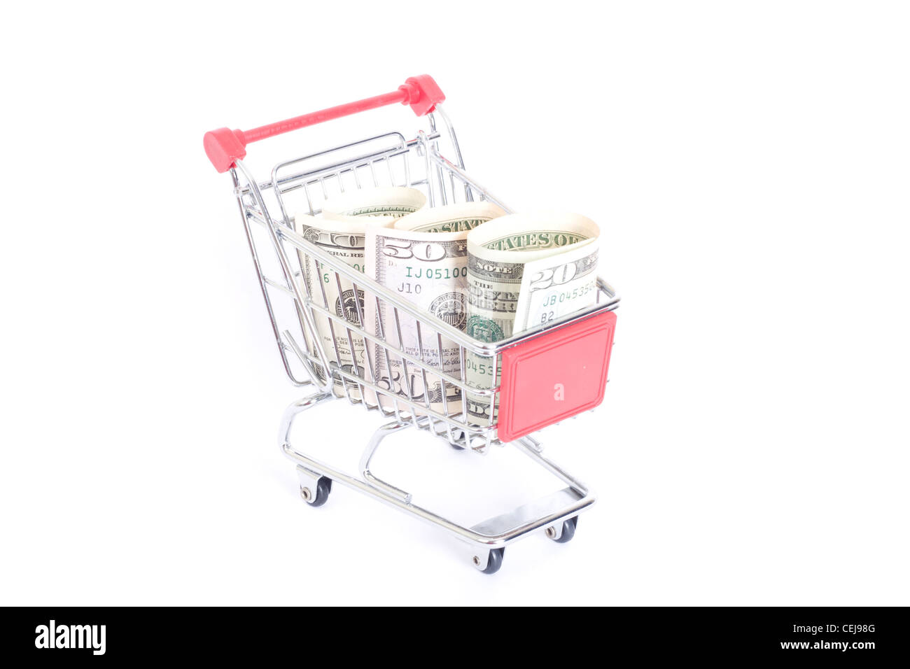 money on shopping trolley Stock Photo - Alamy