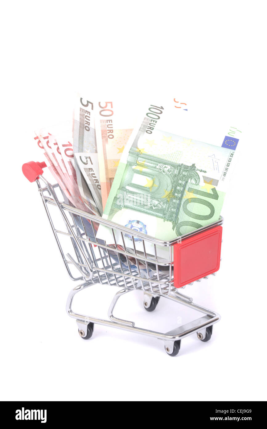 money on shopping trolley Stock Photo - Alamy