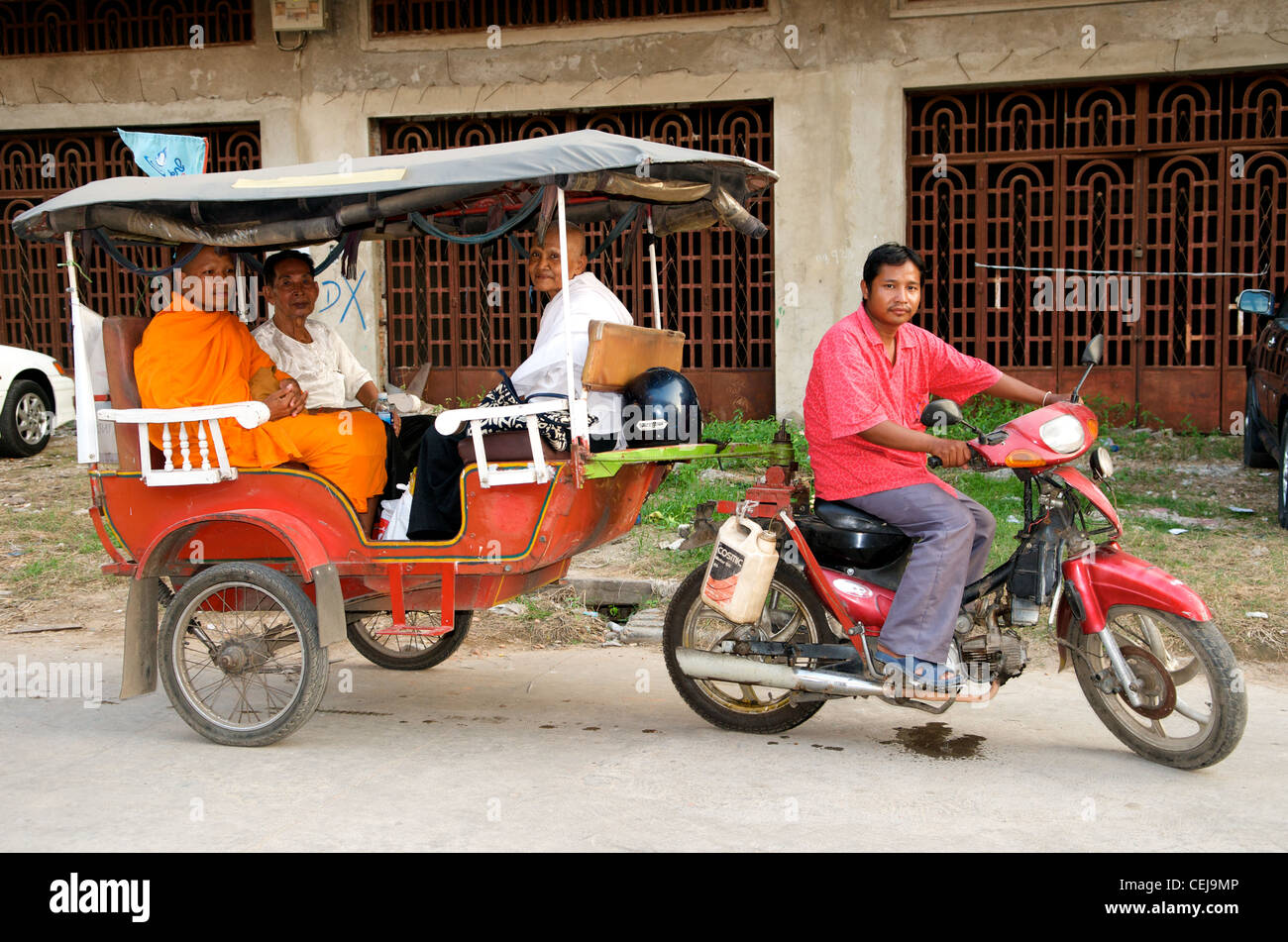 Monk buddhist riding motorcycle hi-res stock photography and images - Alamy