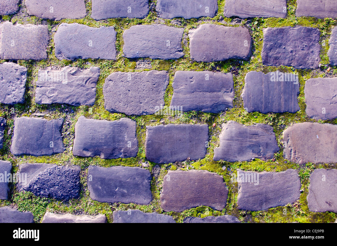ancient old town pavement bricks background Stock Photo - Alamy