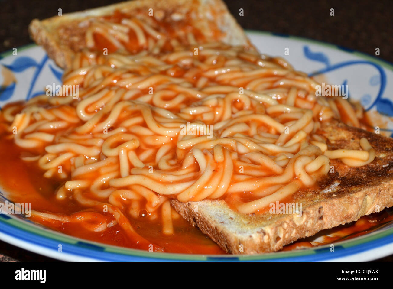 a plate of canned spaghetti on toast Stock Photo - Alamy