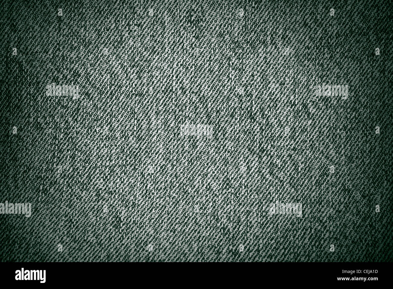 green real textile texture, vignette background to insert text or ...