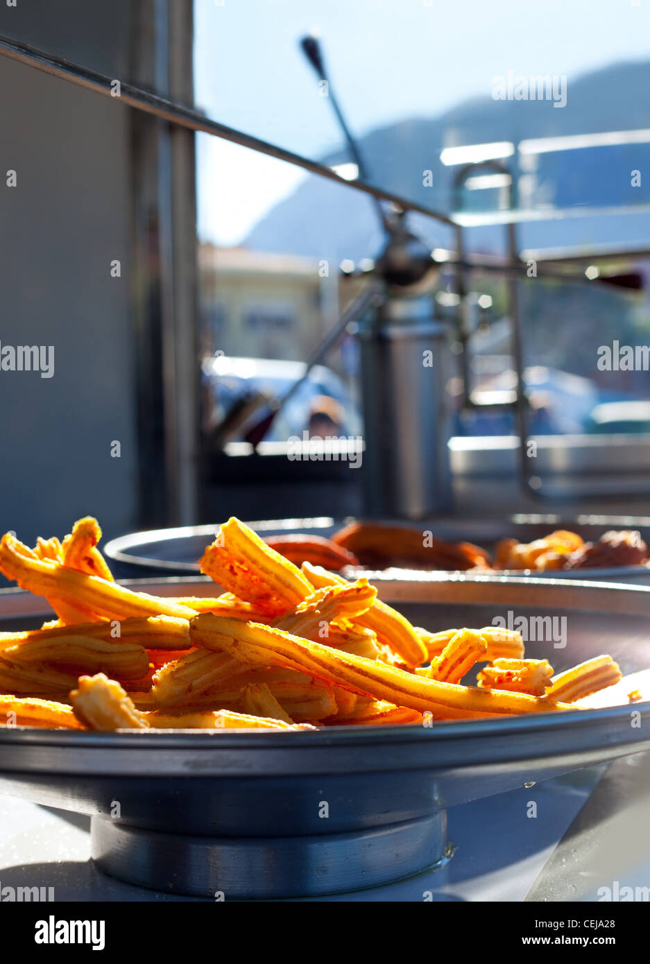 churros fried flour fritters spanish in the market Stock Photo - Alamy