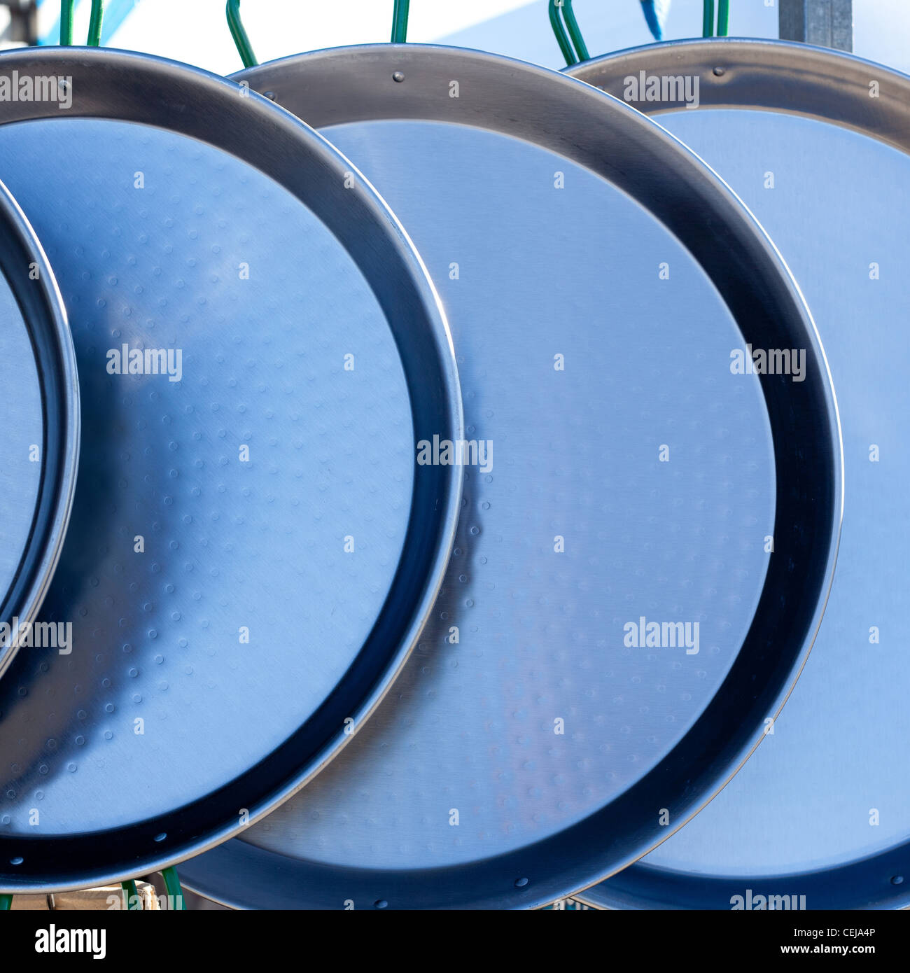 iron paella typical pan from mediterranean Spain in a row Stock Photo ...