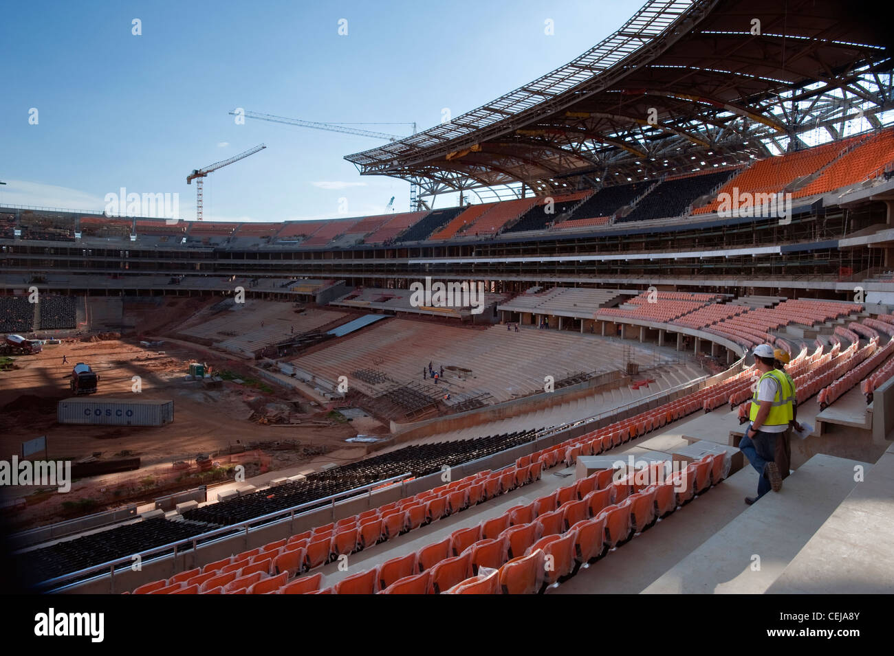 Construction worker soccer stadium hi-res stock photography and images ...