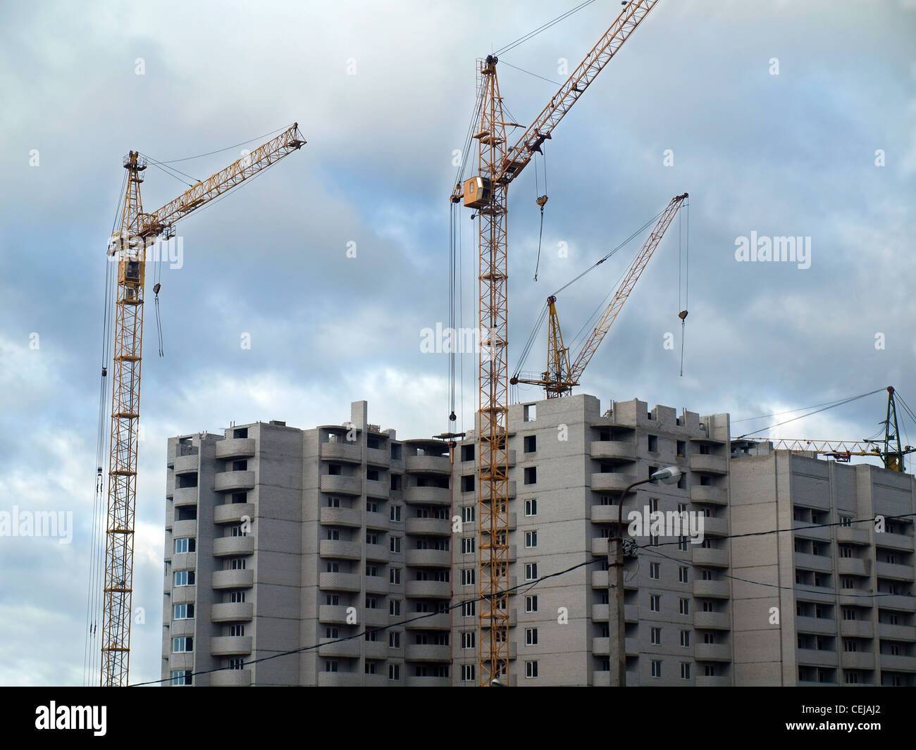 Cranes and building construction Stock Photo - Alamy