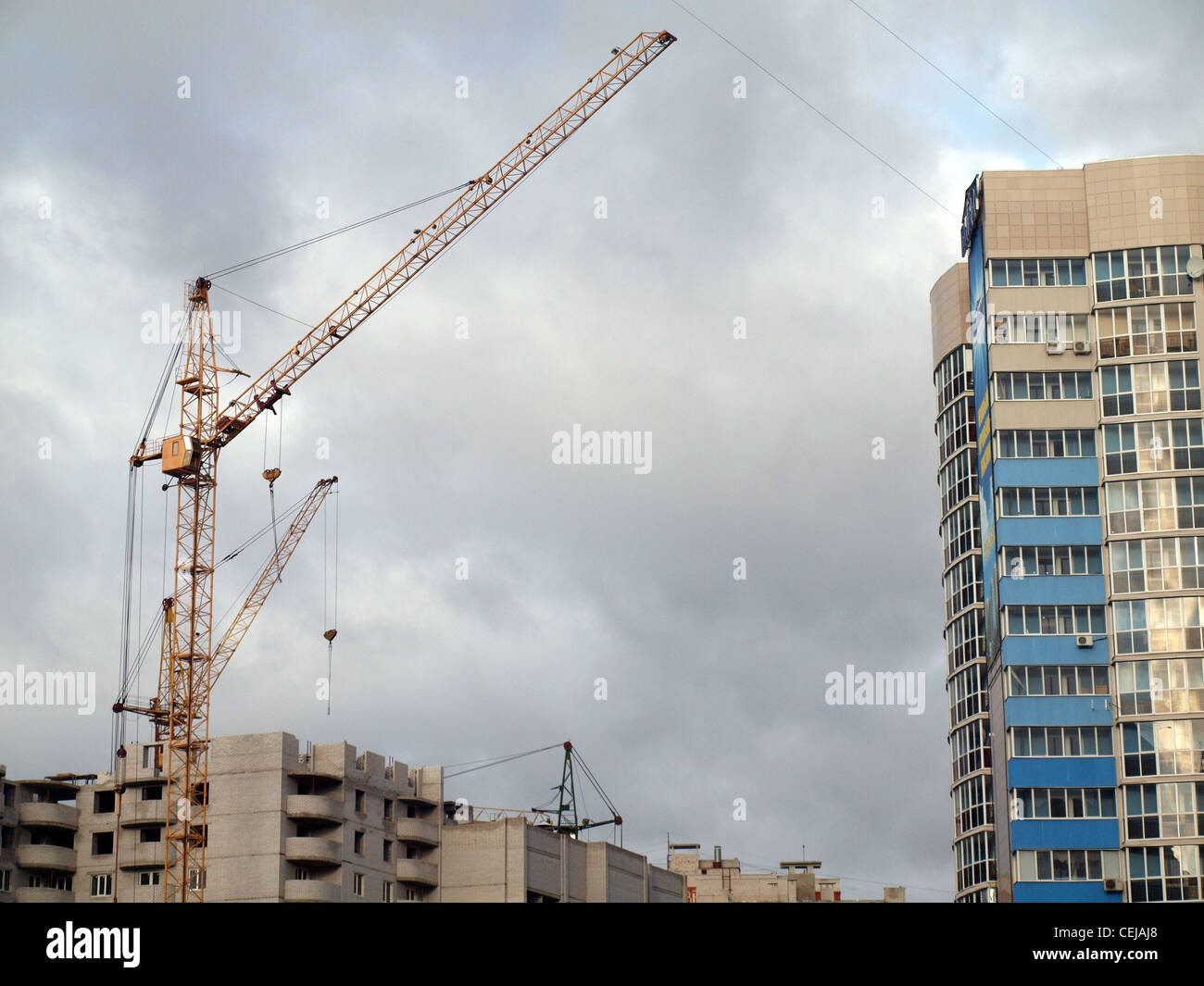 Cranes and building construction Stock Photo - Alamy