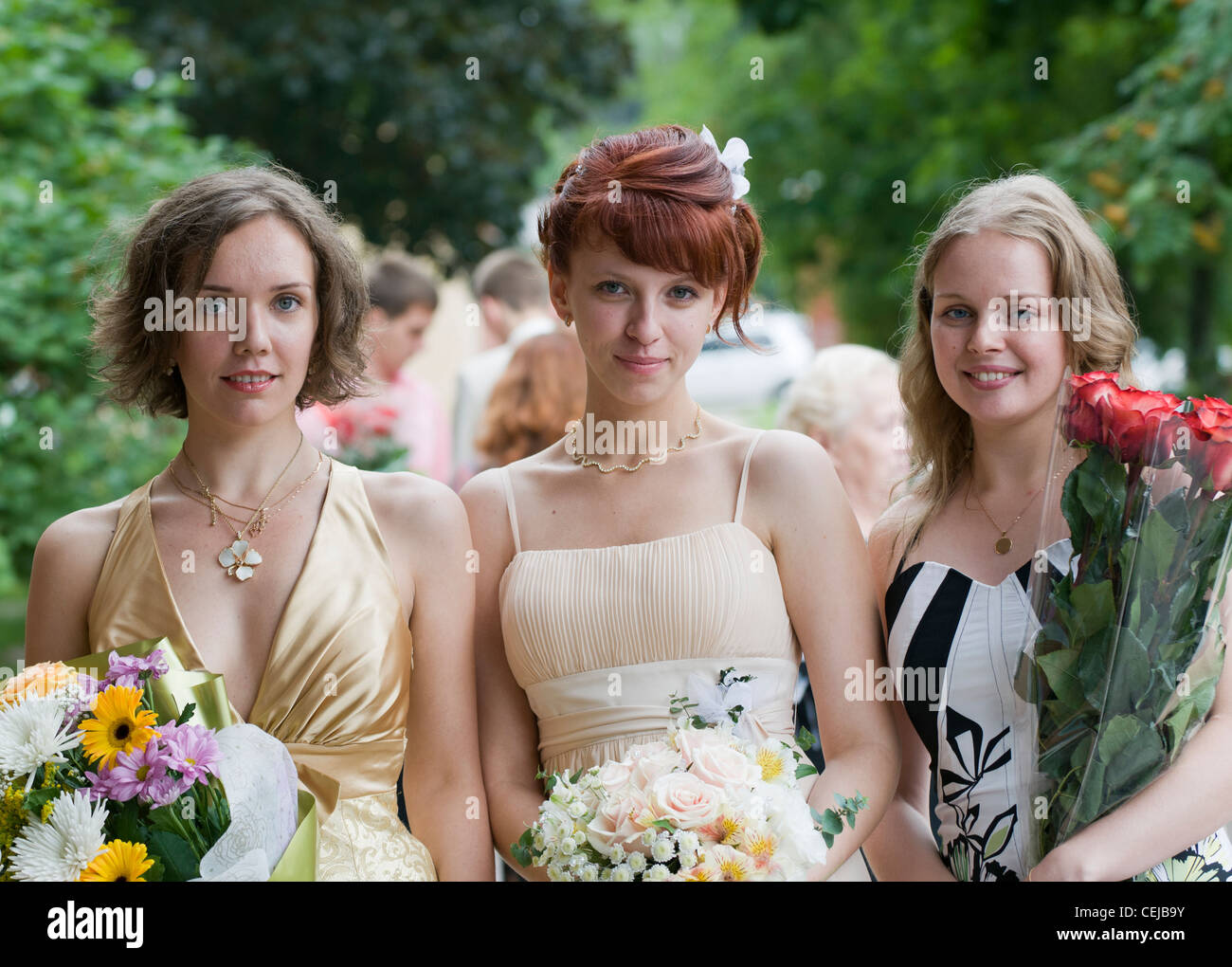 Young bride with her friends at the wedding Stock Photo - Alamy