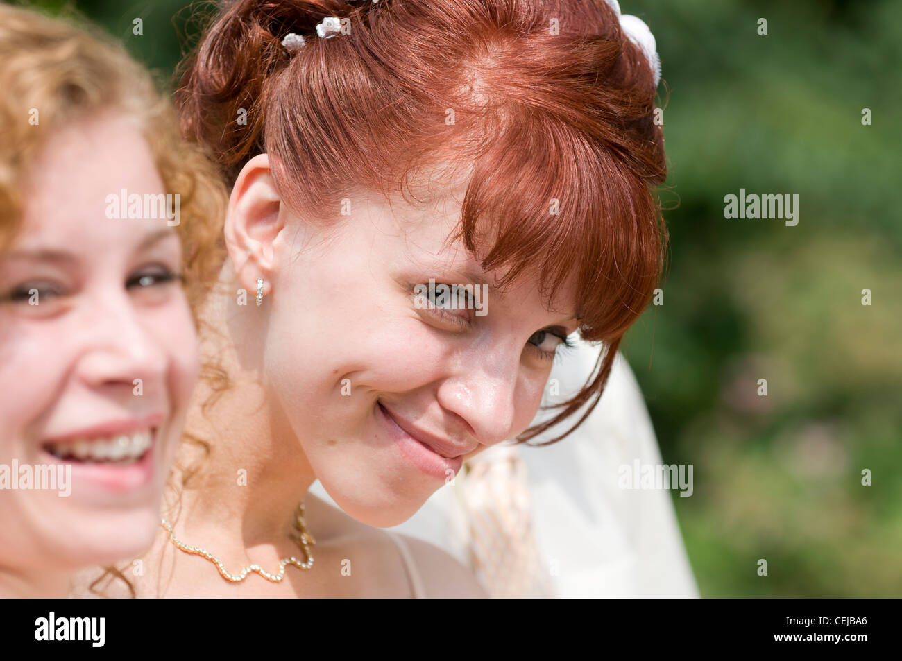 Young bride with her friends at the wedding Stock Photo - Alamy