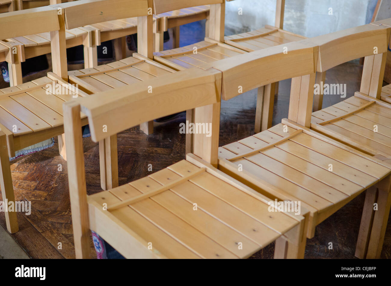 Rows of interlocking chairs Stock Photo - Alamy