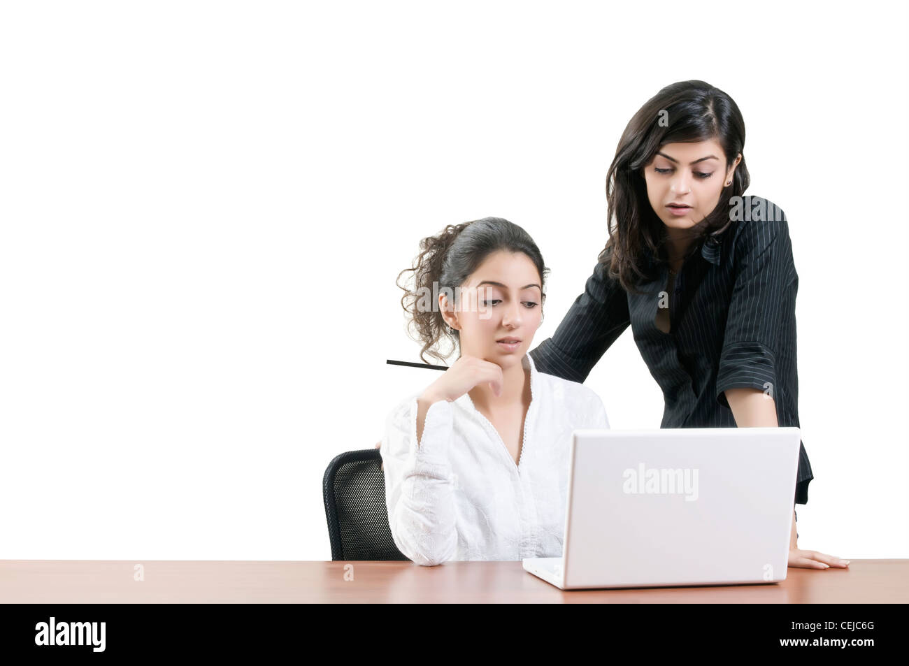 two girls working Stock Photo - Alamy