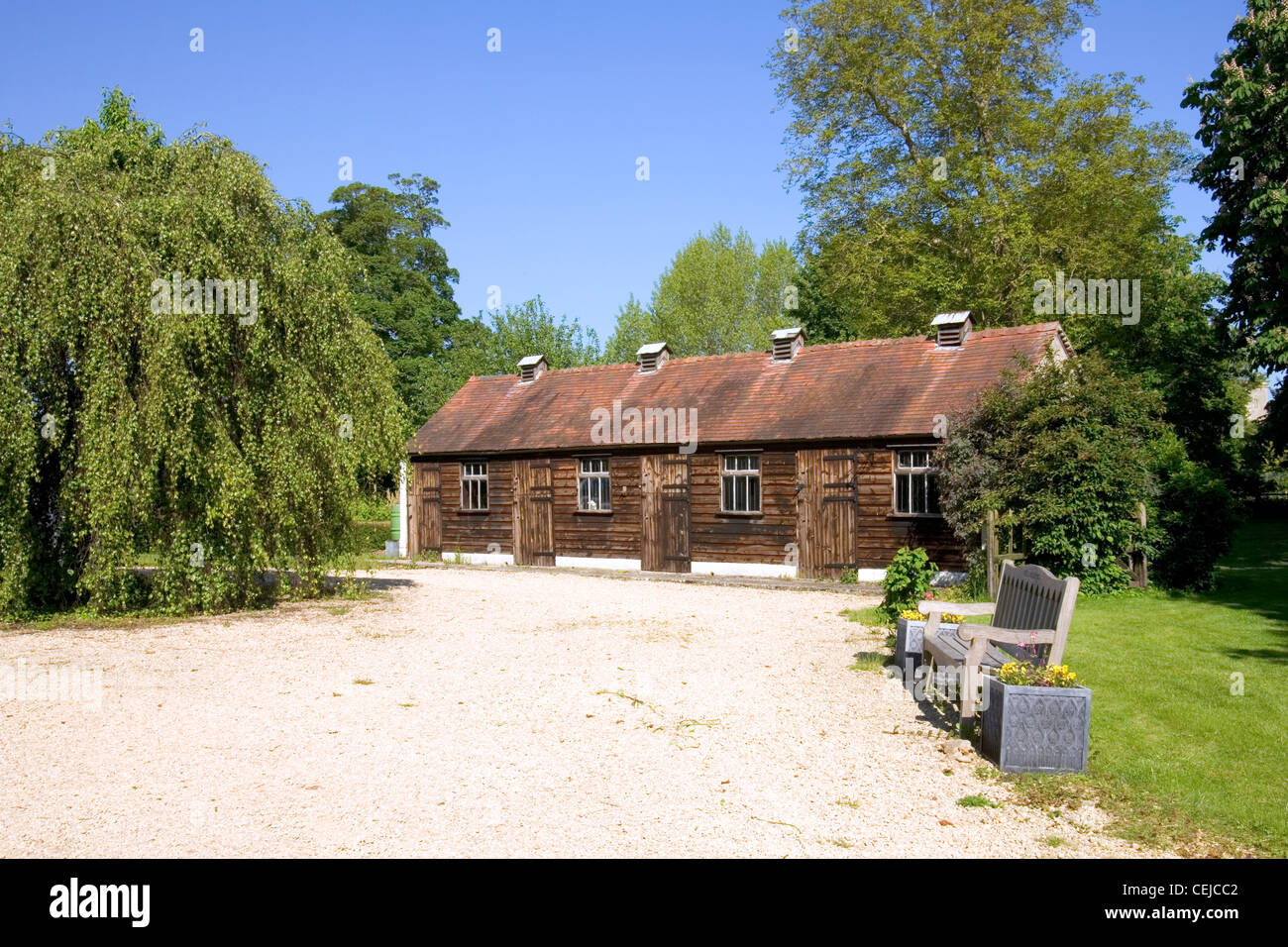 UK. A small traditional wood built horse stable block Stock Photo - Alamy