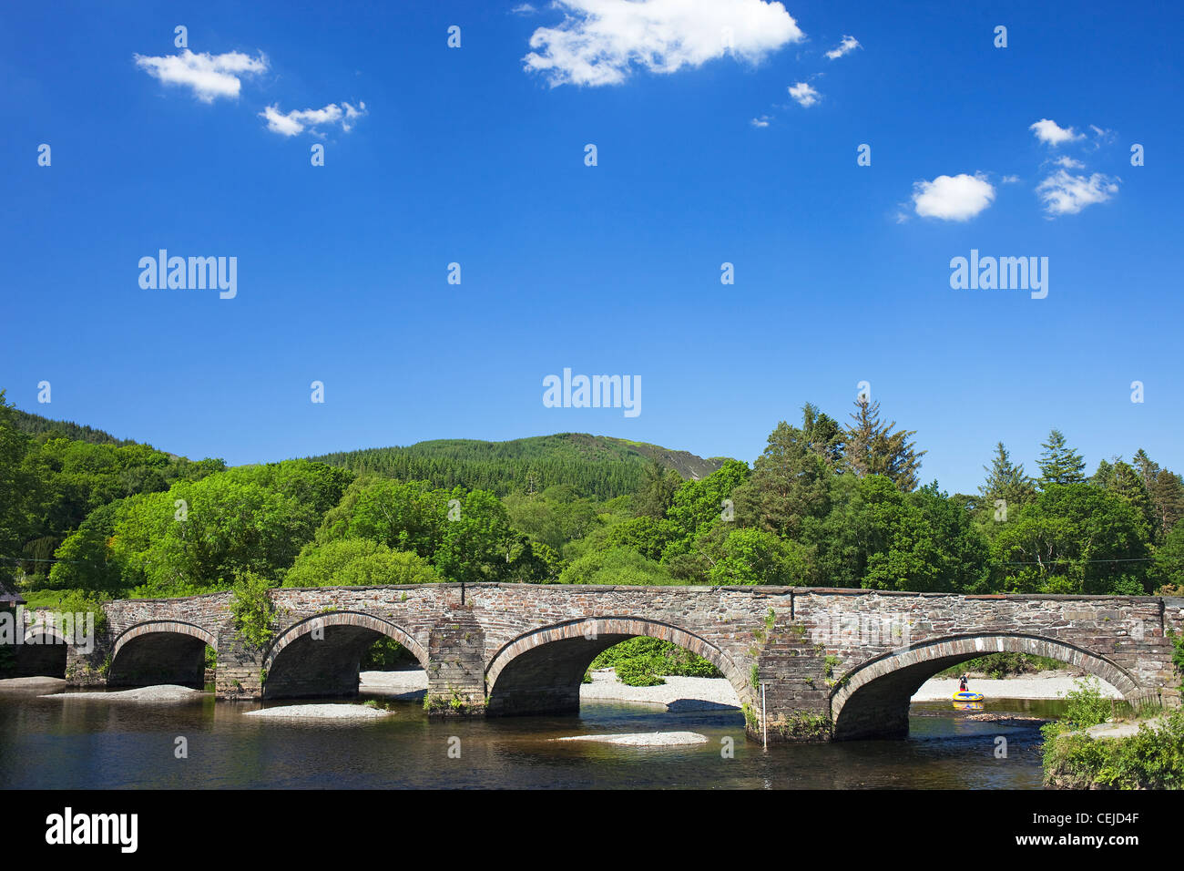 Wales, Gwynedd, Snowdonia National Park, River and Stone Arched Bridge ...