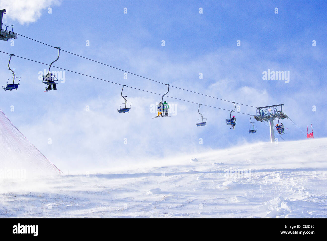 chair lift in the mountain whit storm wind Stock Photo - Alamy