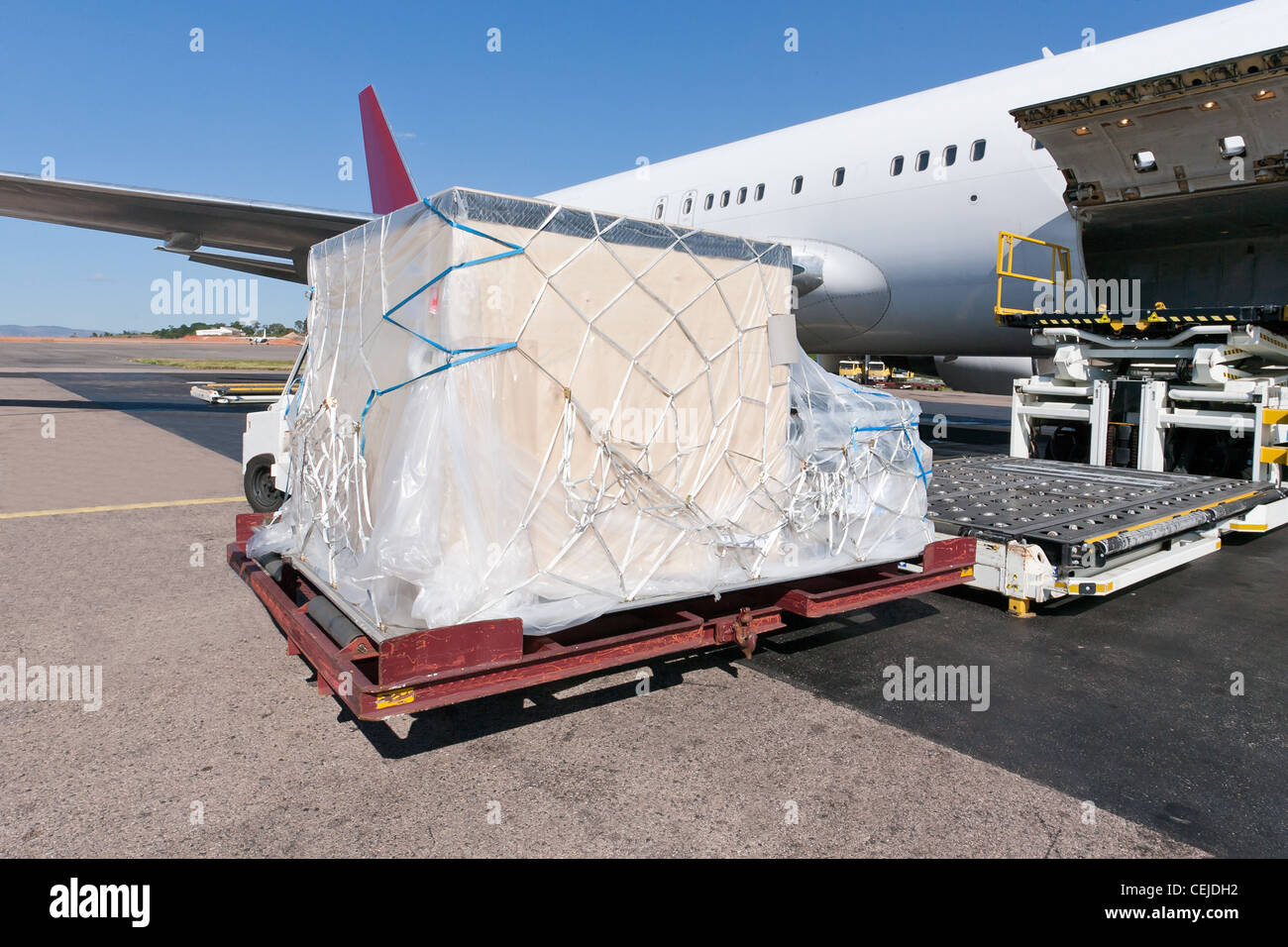 Loading platform of air freight to the aircraft Stock Photo - Alamy