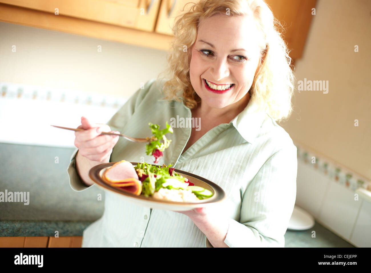 Woman 40`s vitality eat hi-res stock photography and images - Alamy