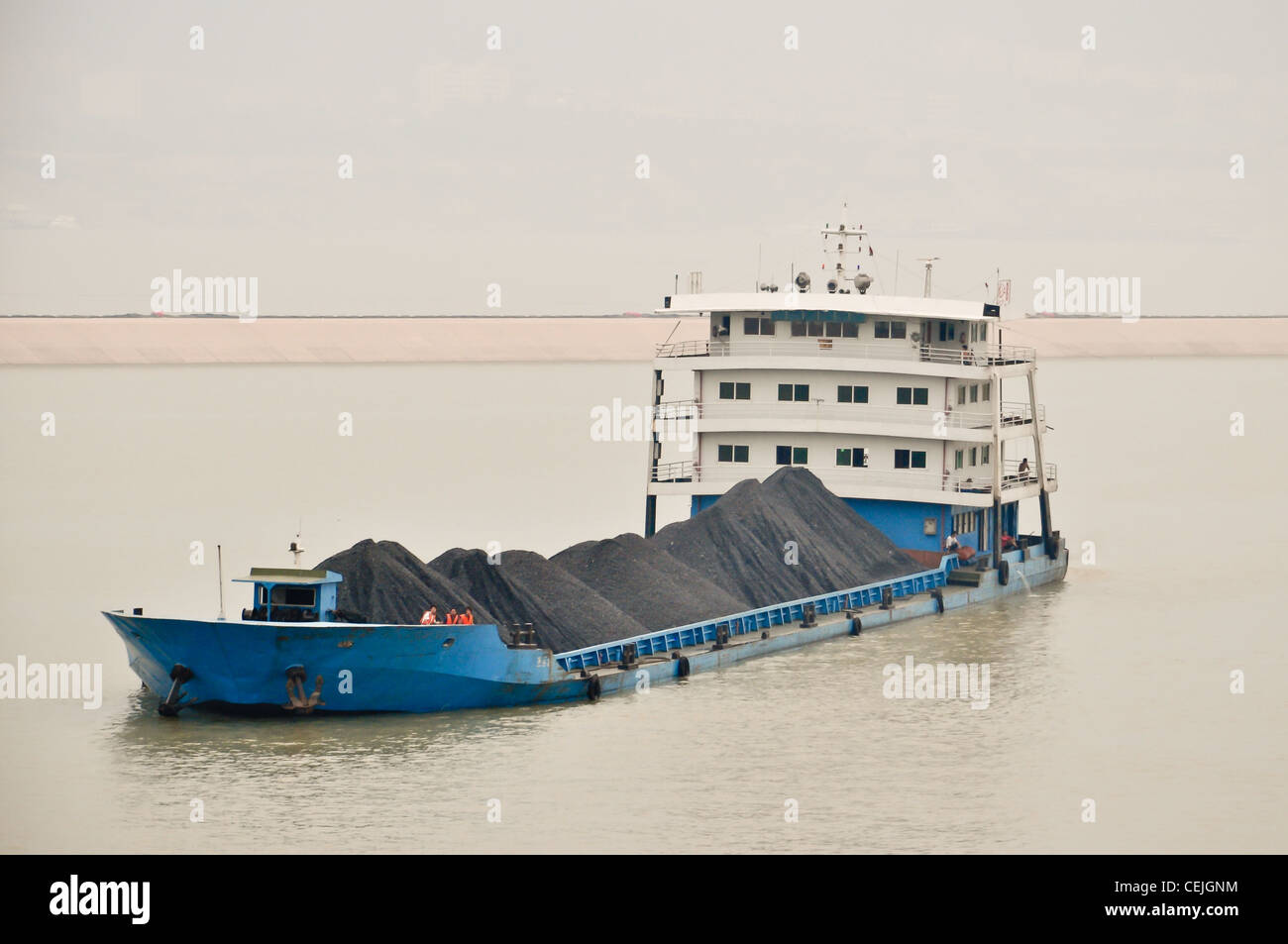 freighter on a river Stock Photo - Alamy