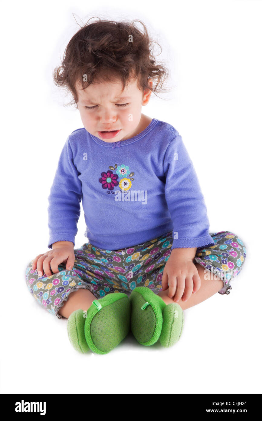 Crying little princess isolated in white Stock Photo - Alamy