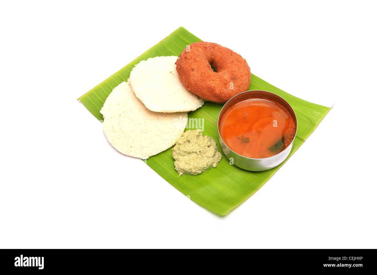Idli, vada, sambhar and chutney, south Indian dish served on Banana ...