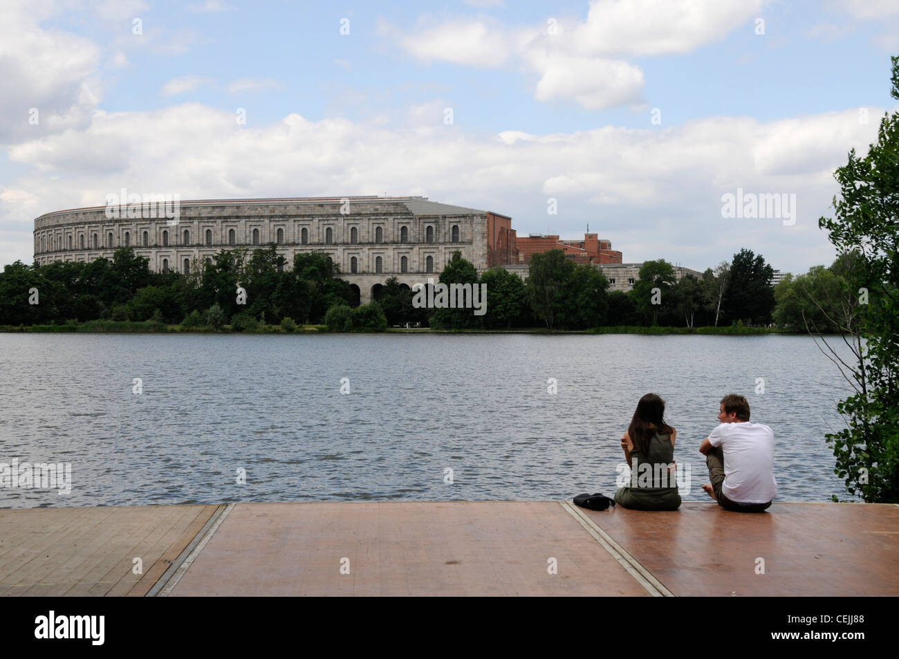 Across a large lake is the imposing remains of the Congress Hall (Die ...