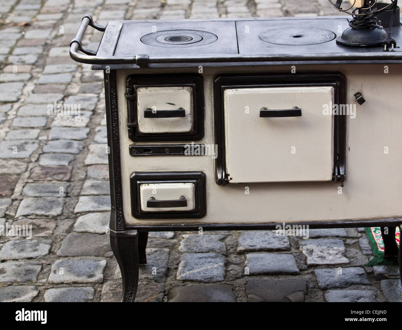 old cooking stove presented on the open market Stock Photo - Alamy