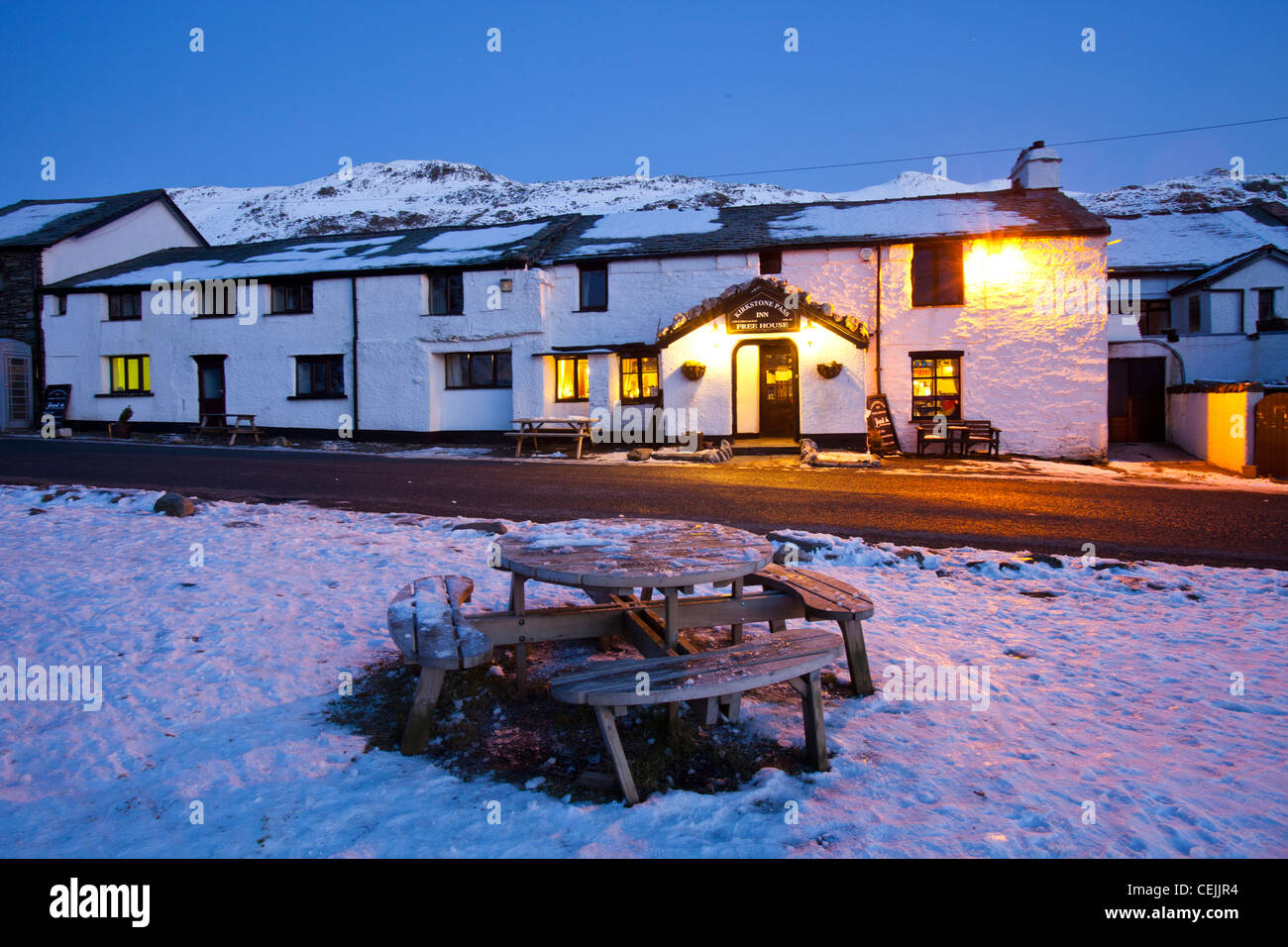 the Kirkstone Pass Inn on Kirkstone pass in the Lake District at dusk ...