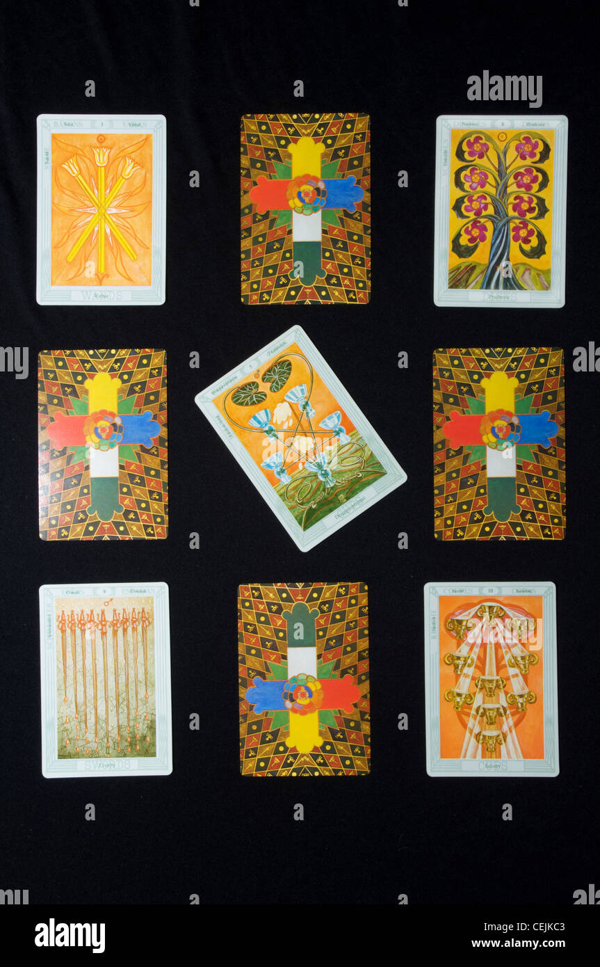 Tarot cards layed out in a square with Disappointment card in the ...