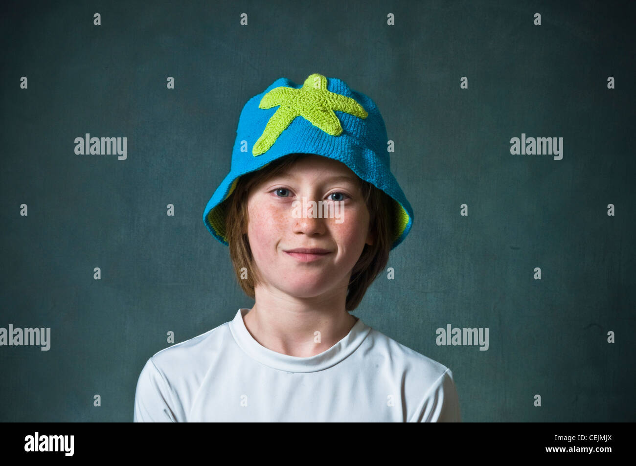 Young girl, funny face, starfish hat Stock Photo - Alamy