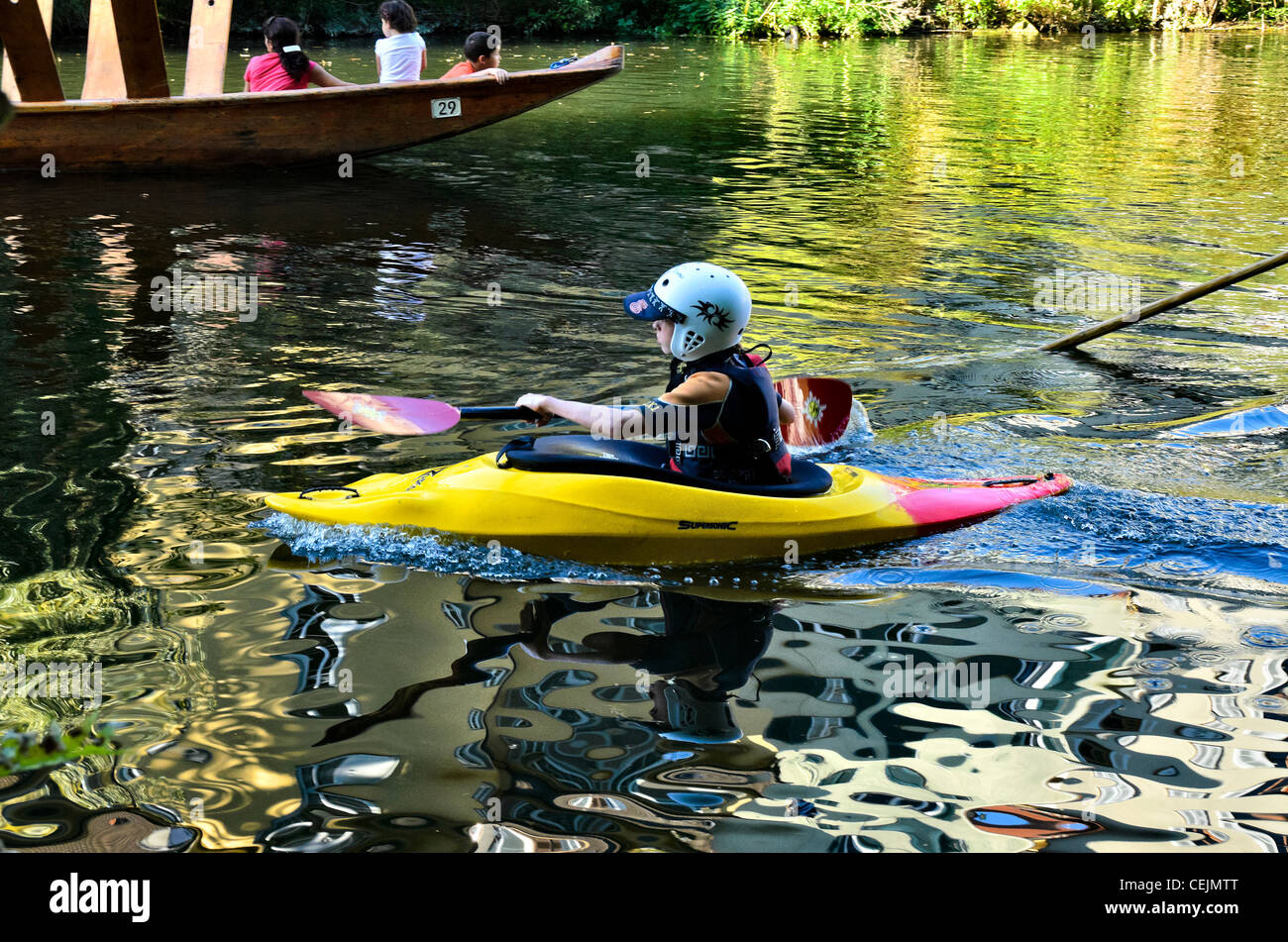 Young boy kayaking the Neckar River Stock Photo - Alamy