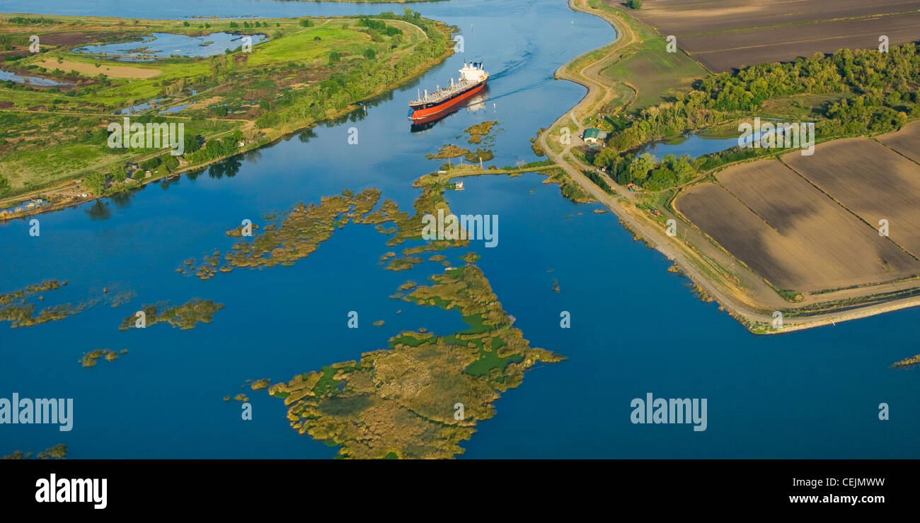 Aerial view of an ocean going grain ship transiting the deep water ...