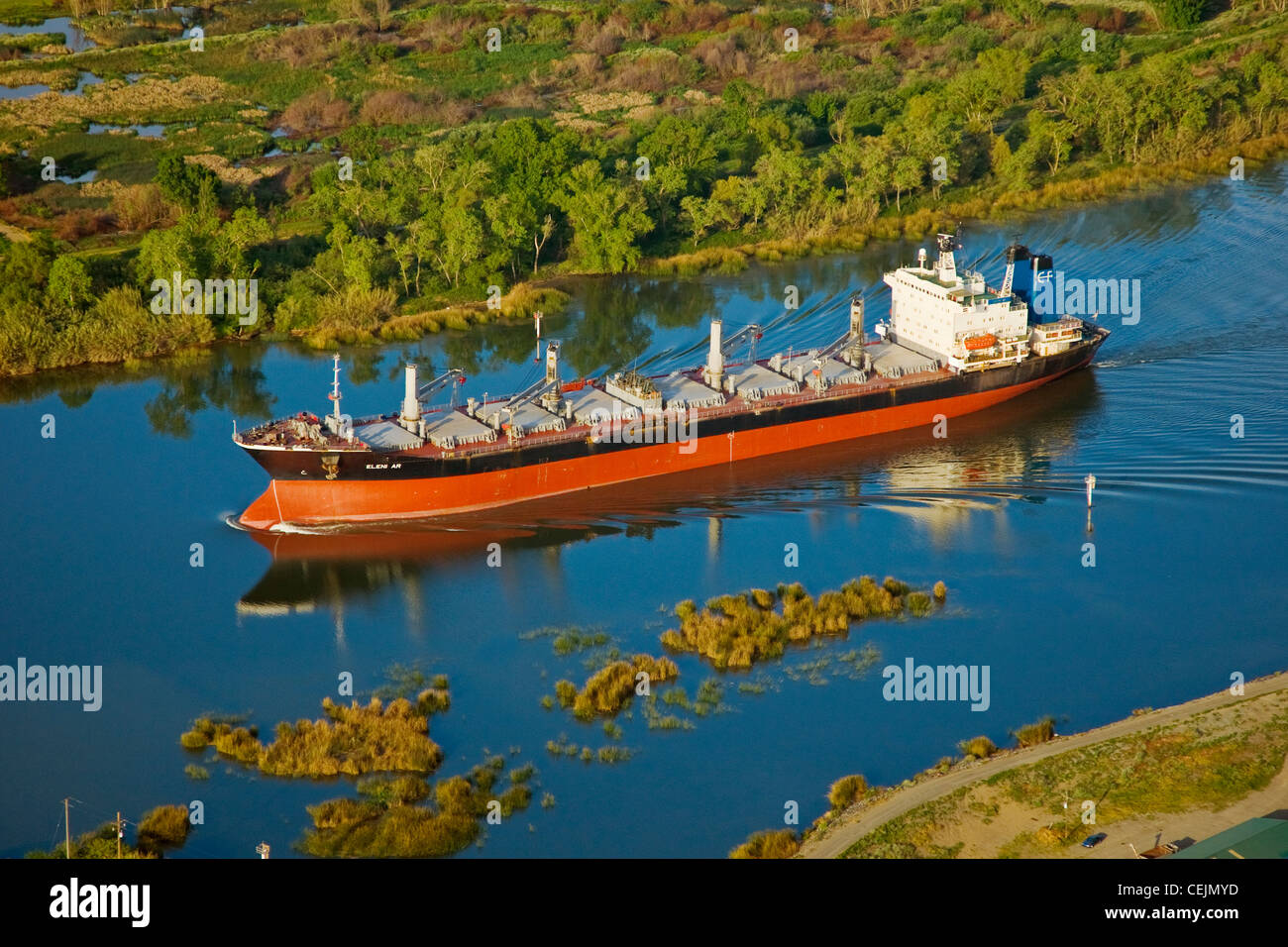 Aerial view of an ocean going grain ship transiting the deep water ...
