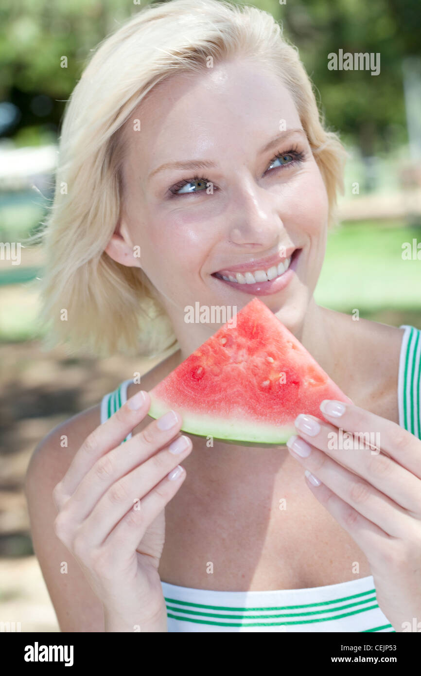 Female eating watermelon Stock Photo - Alamy