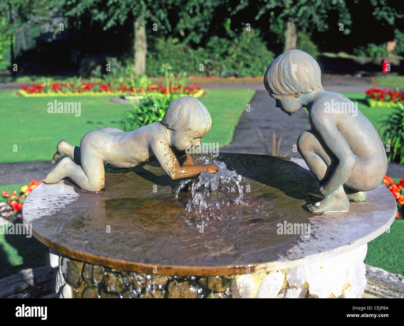 Sculpture and fountain water feature of two children playing in Valley ...