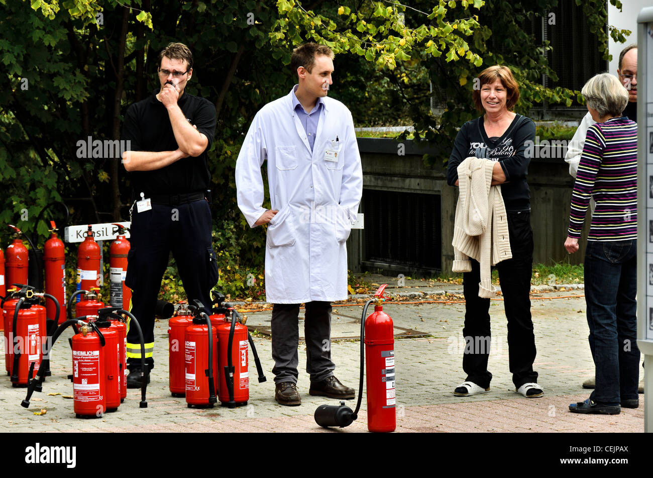 People at fire fighting training Stock Photo - Alamy