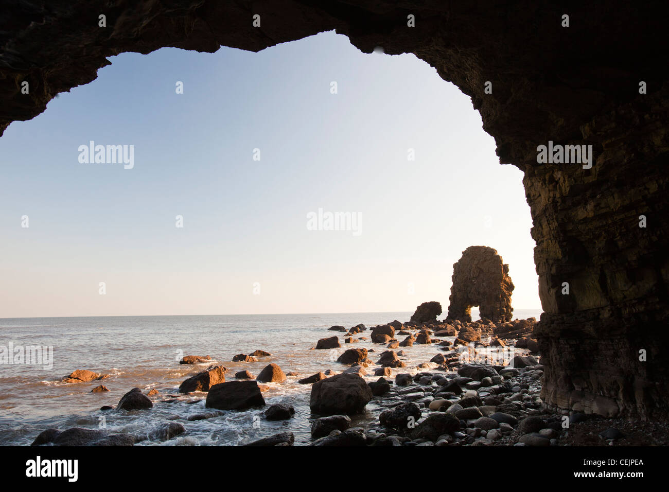 Sea stacks and sea arch on the North East coast at Whitburn between ...