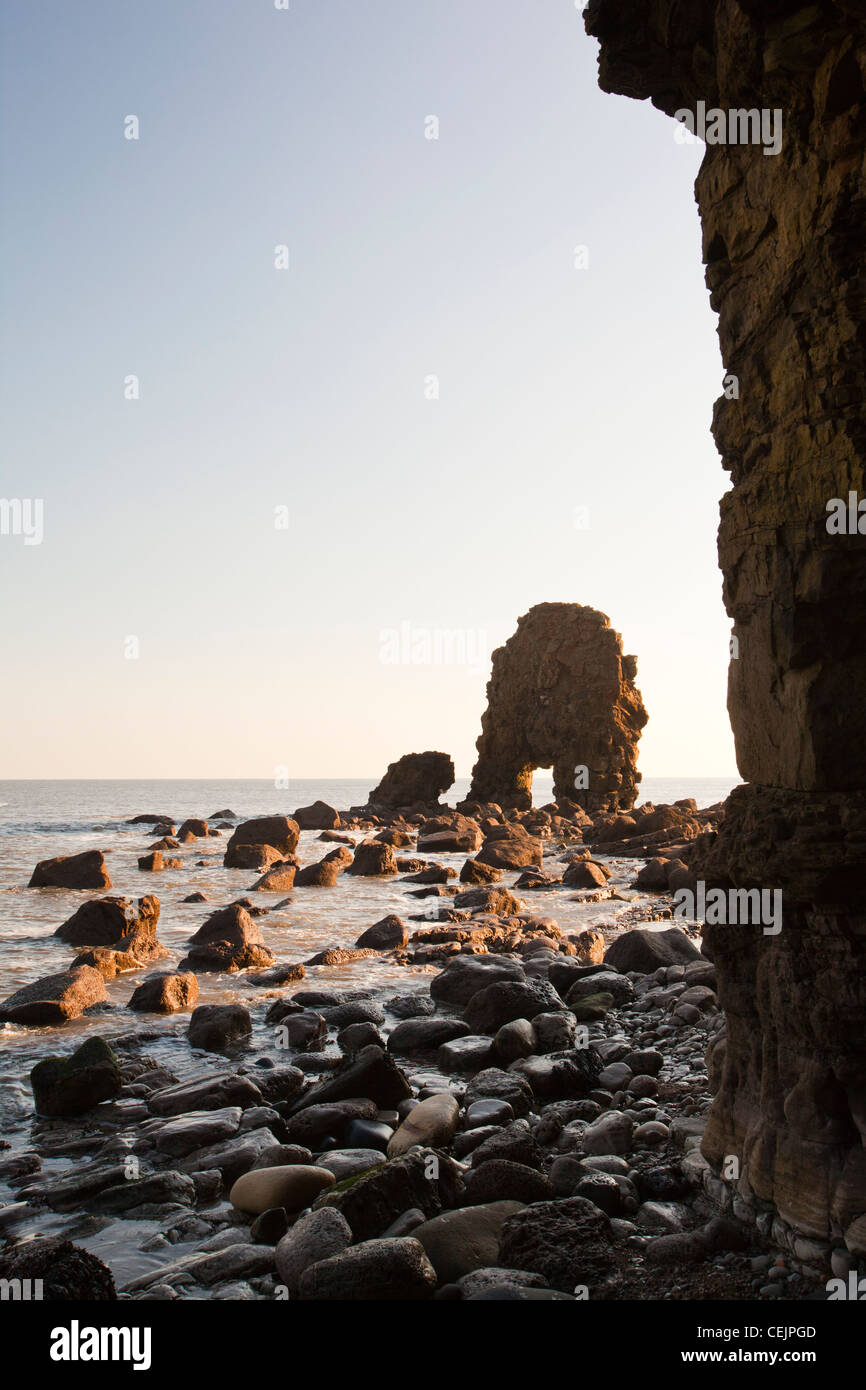 Sea stacks and sea arch on the North East coast at Whitburn between ...