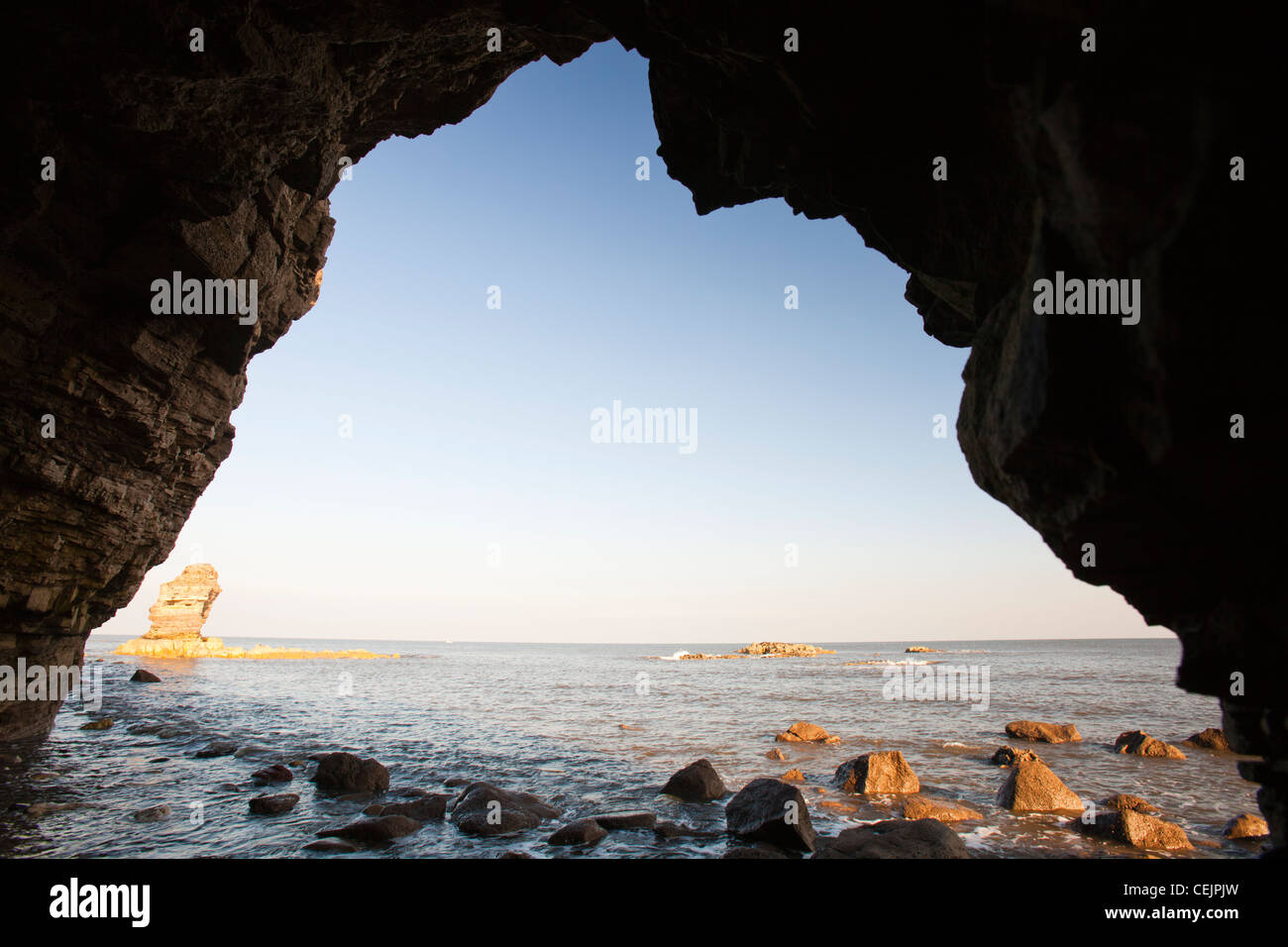 Sea stacks and sea arch on the North East coast at Whitburn between ...