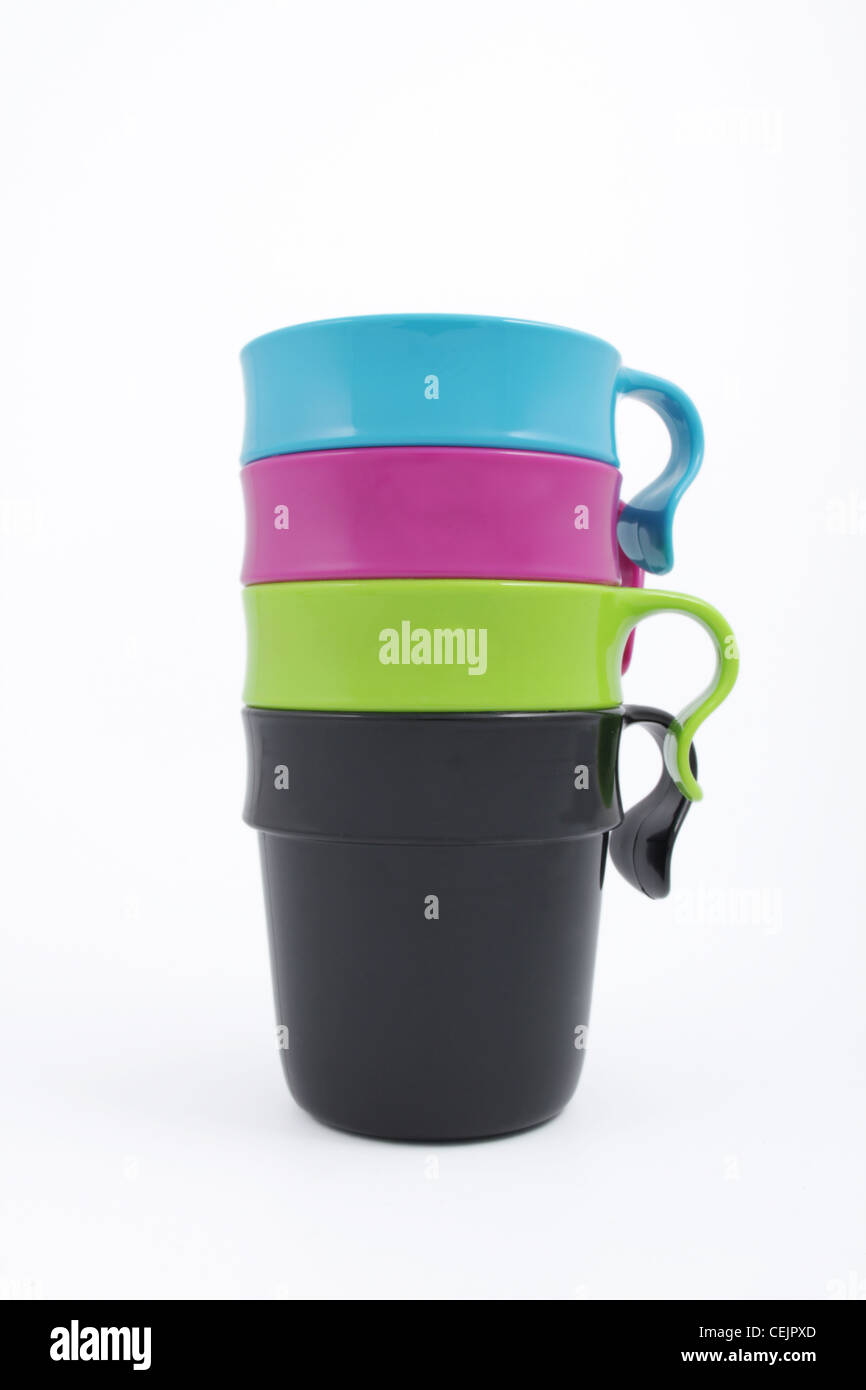 Stack of colorful plastic mugs in different colors Stock Photo - Alamy