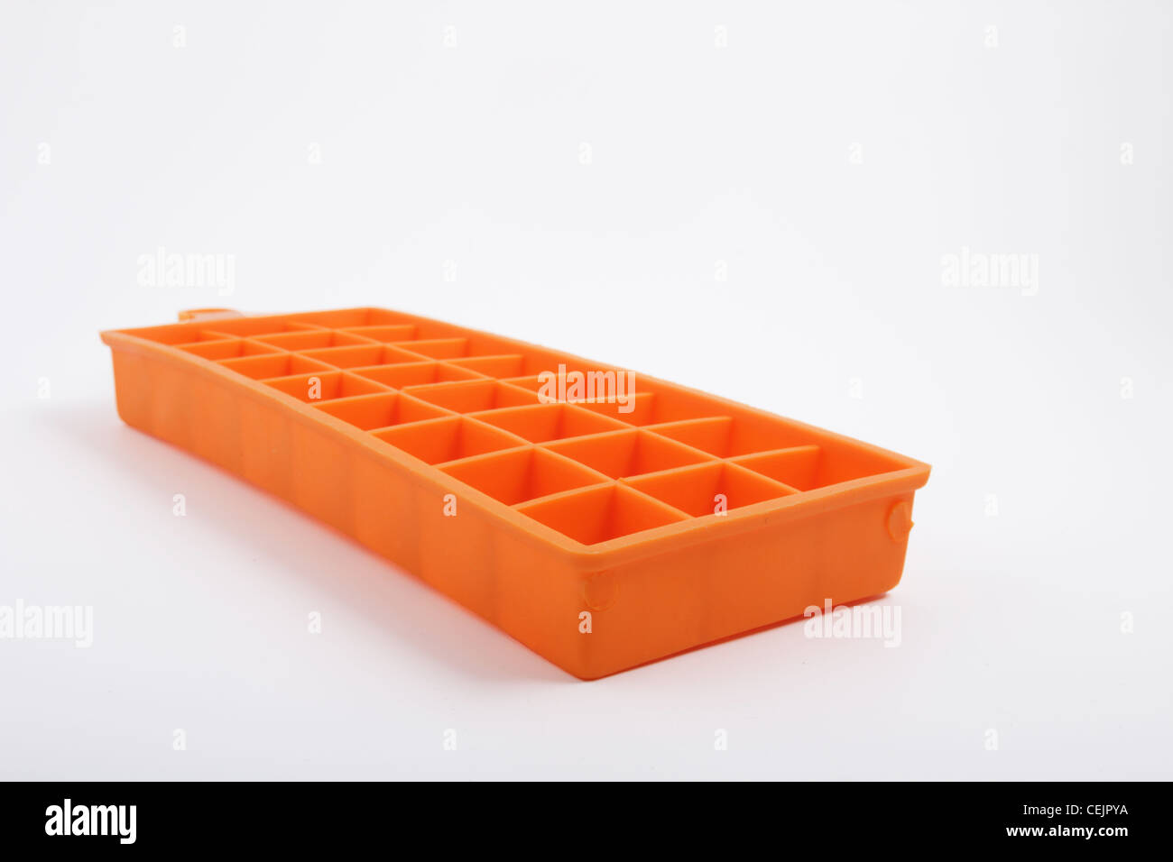 Orange ice cube maker Stock Photo - Alamy