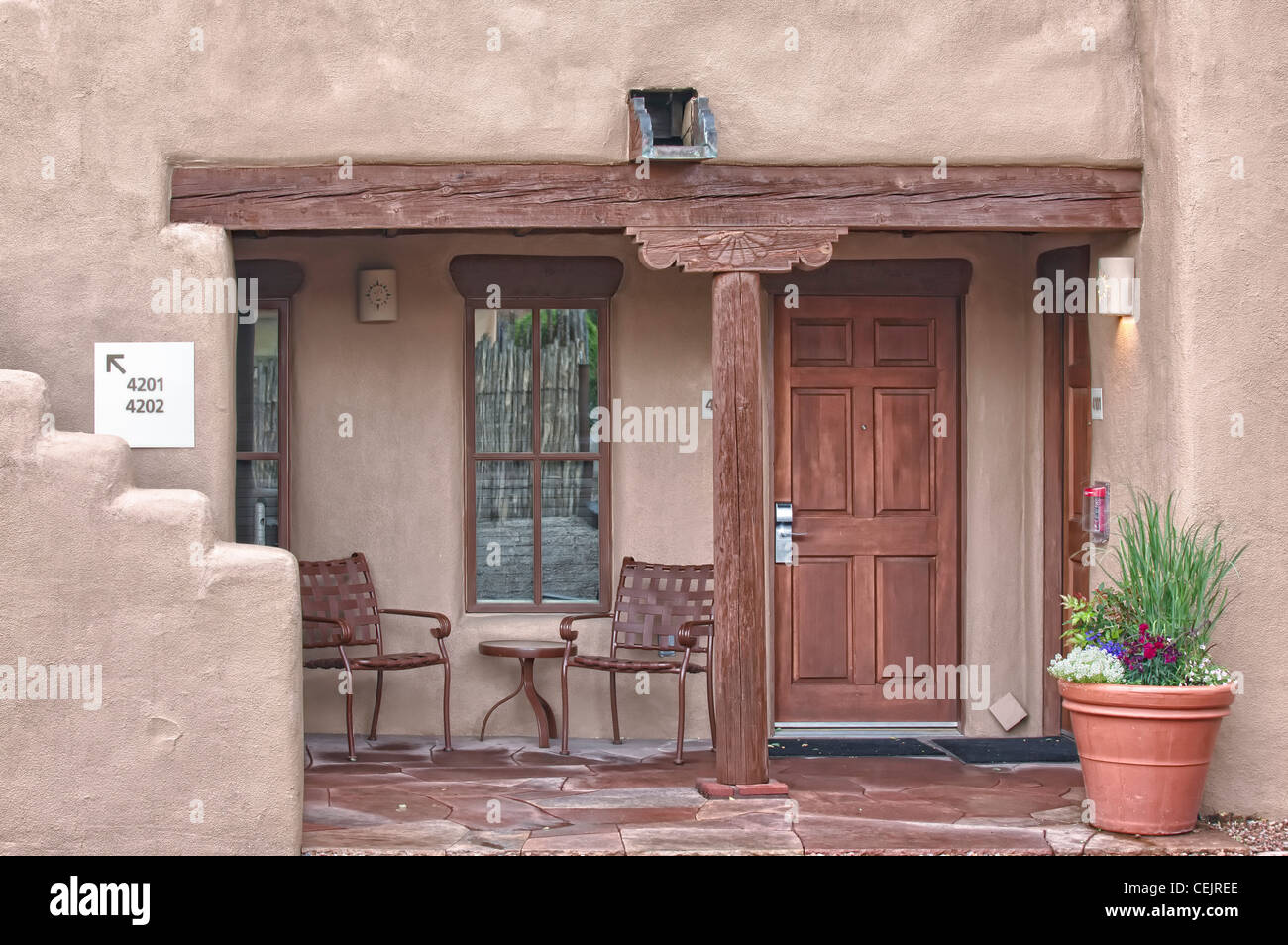An Adobe style hotel room Stock Photo - Alamy