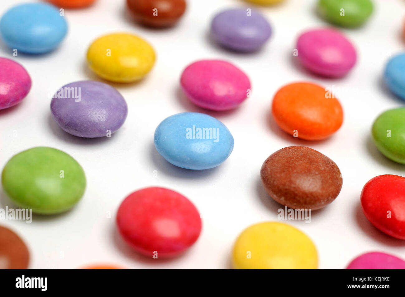 Multi coloured sugar coated chocolate Stock Photo - Alamy