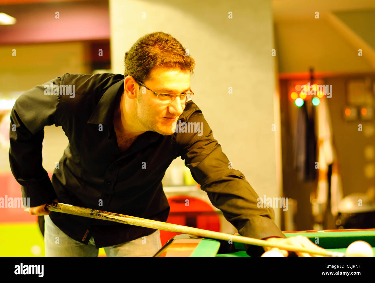 Man playing pool Stock Photo - Alamy