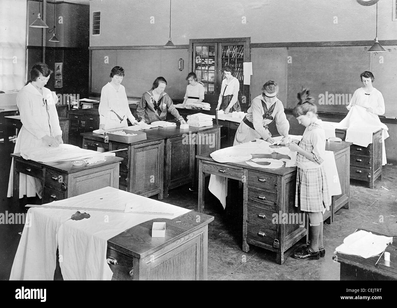 Girl Scout, America, sewing with the Red Cross Stock Photo - Alamy